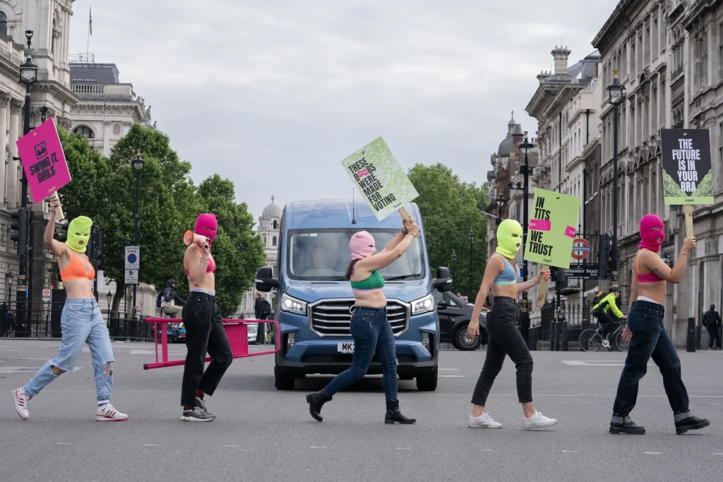 Protesters descend on parliament in BRAS and balaclavas ‘causing riot ...