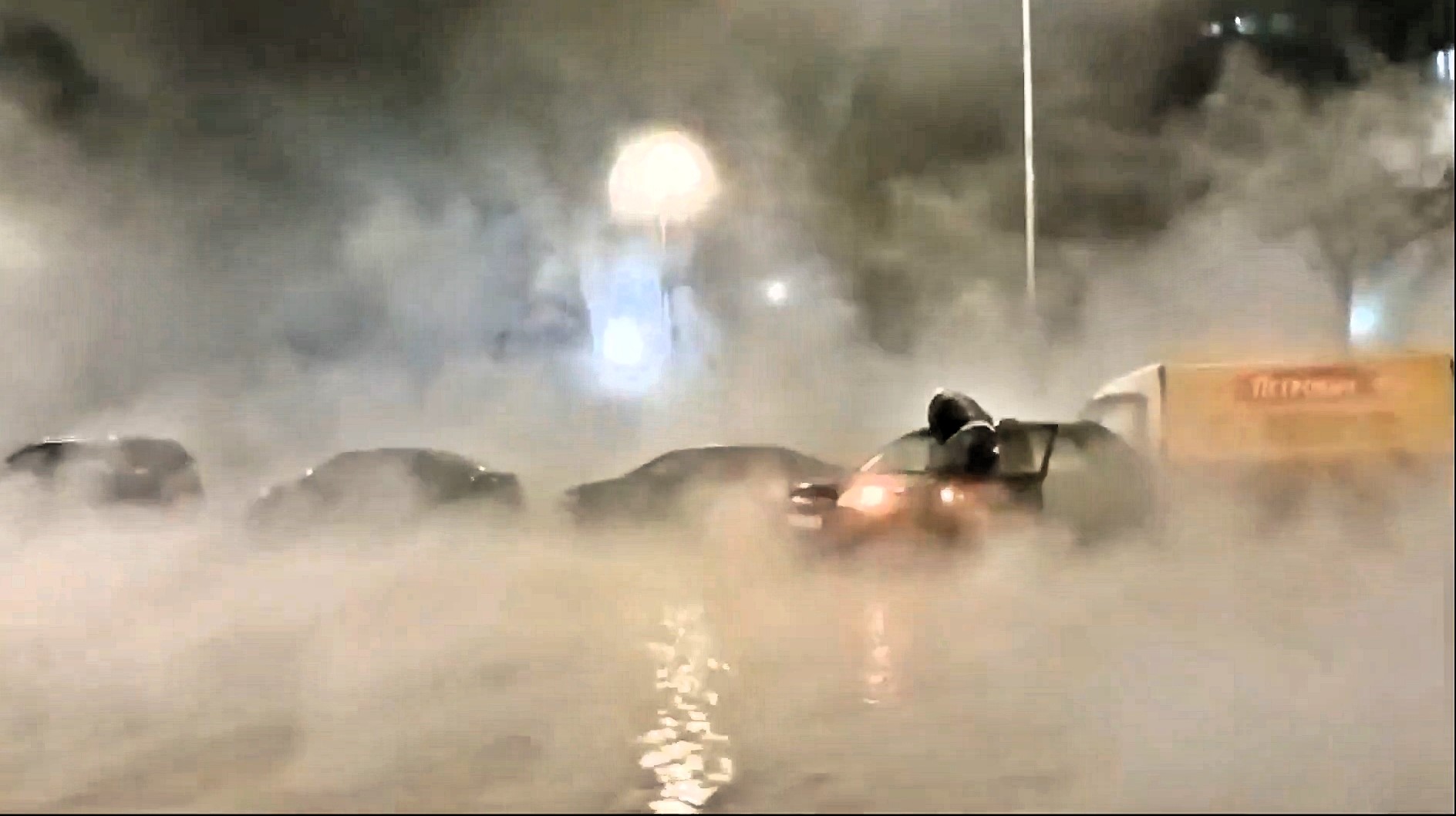 Burned homeowners clamber onto car roofs after BOILING water floods ...