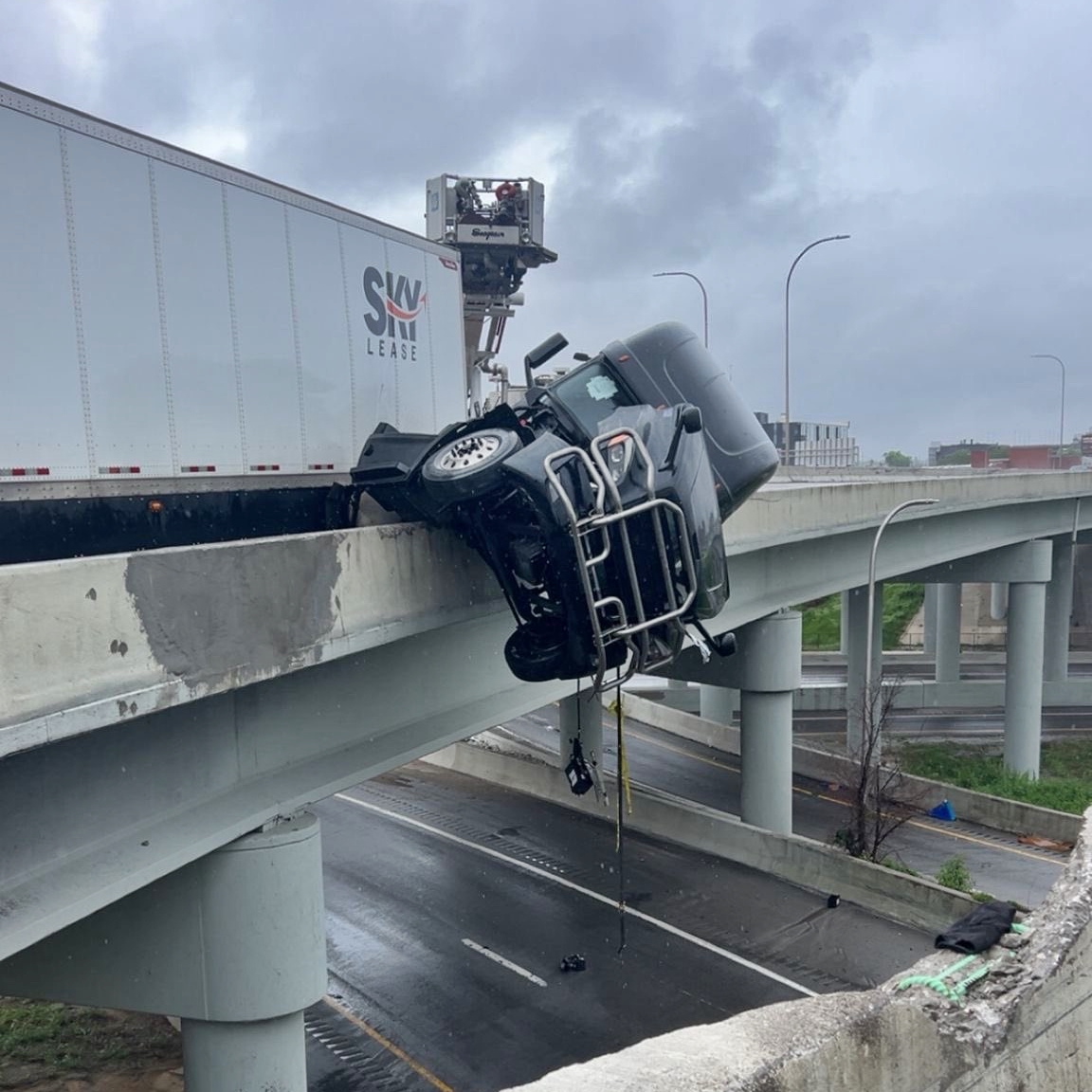 Truck driver left dangling off BRIDGE after losing control | Need To Know