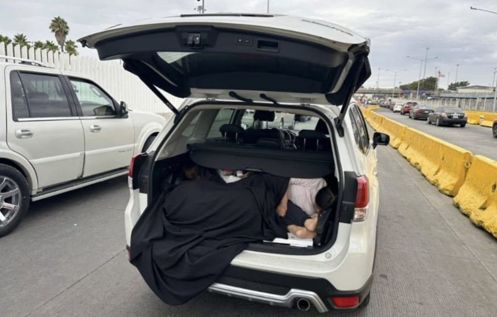 Stunned driver finds three women packed like sardines in her boot at ...