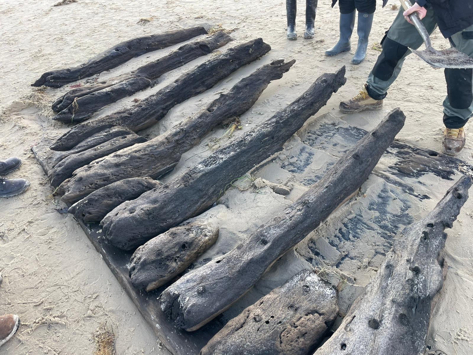 Historic 17th century merchant shipwreck exposed on beach after heavy ...
